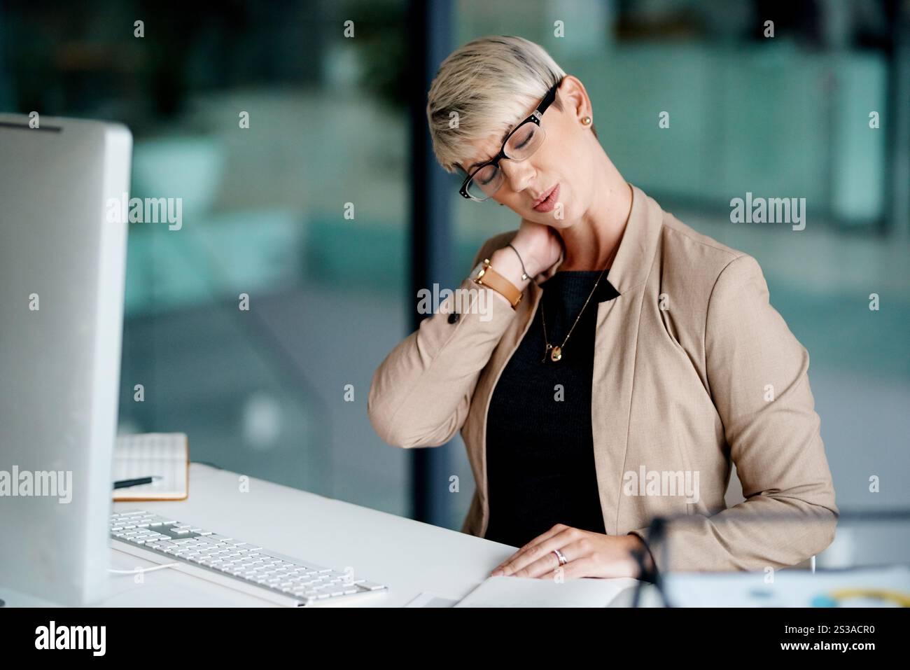 Stress, computer and businesswoman in office with neck pain, injury or ...