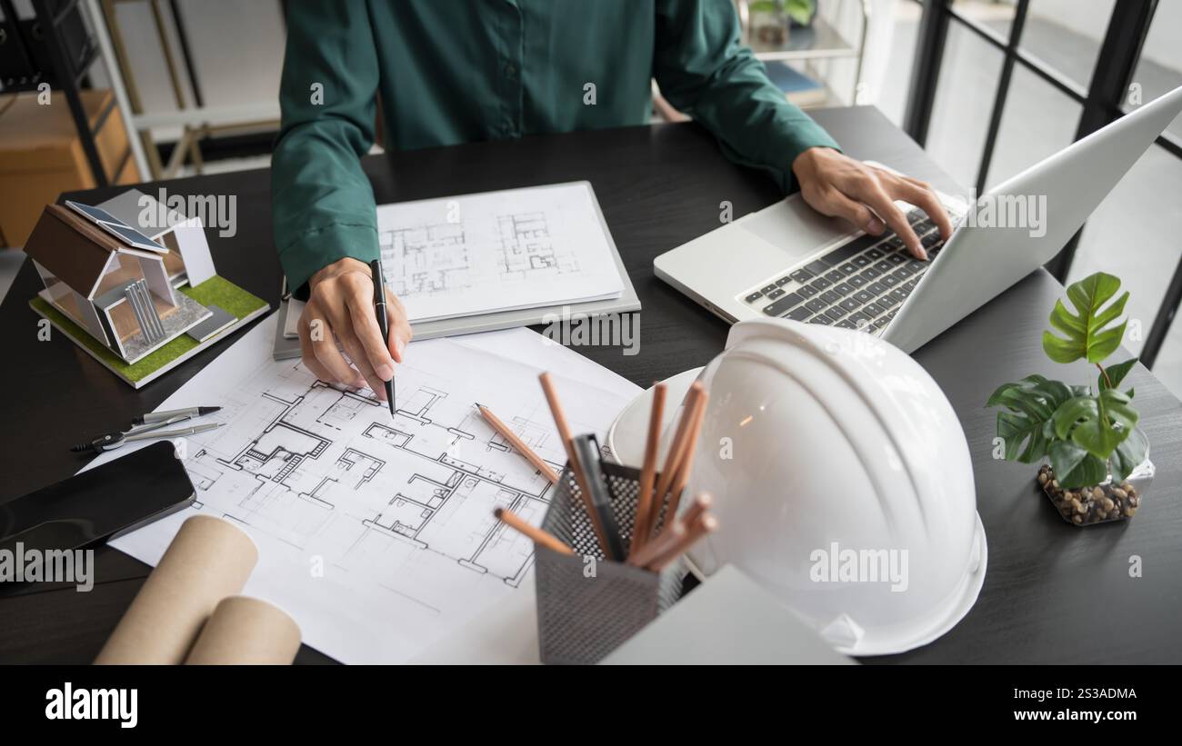 Architecture Man drawing on architectural Creative project business ...