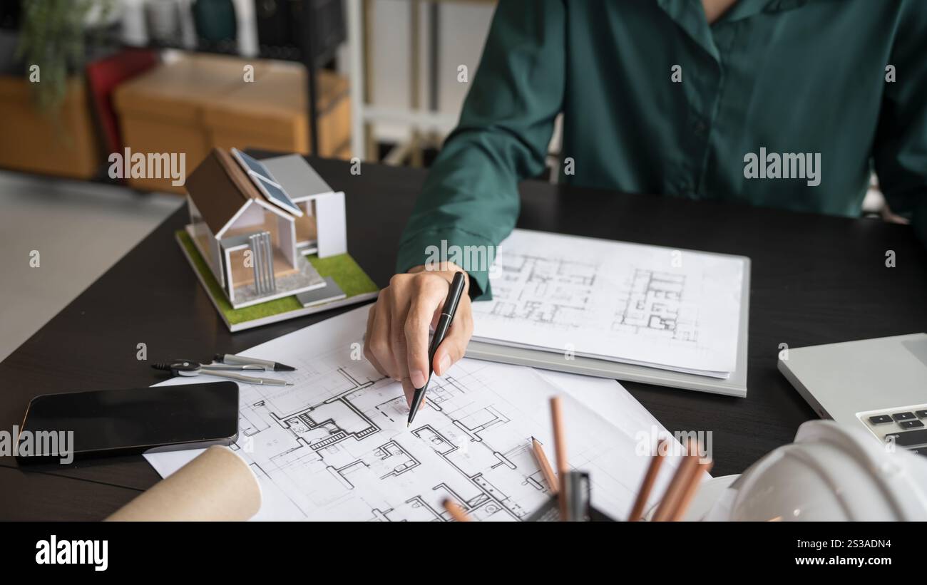 Green Eco Architecture Man drawing on architectural Creative project ...