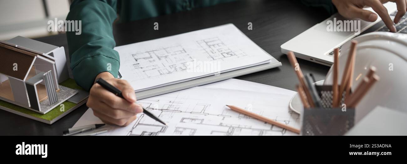 Green Eco Architecture Man drawing on architectural Creative project ...