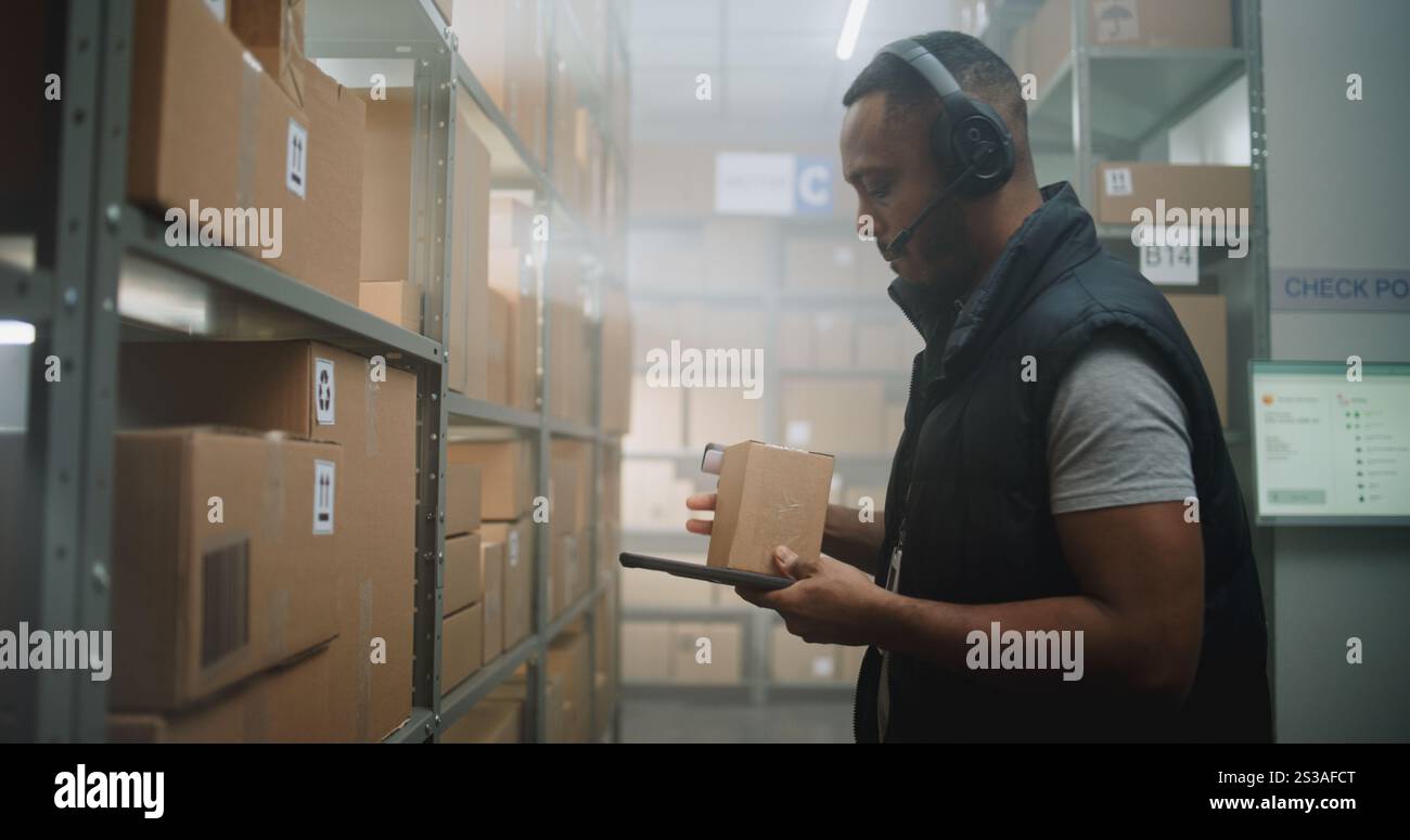 Man scans boxes goods in hi-res stock photography and images - Alamy