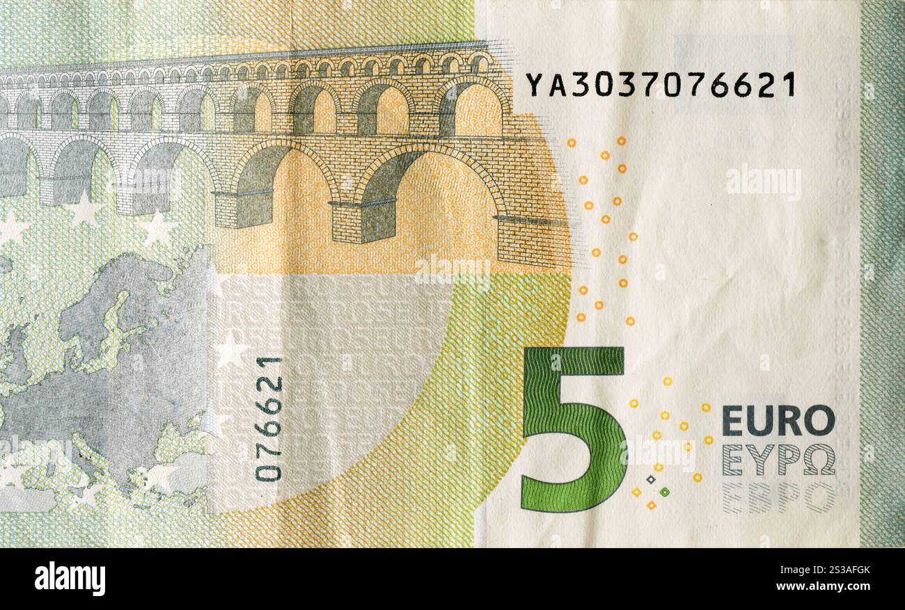 Fragment of one five euro money bill. Colorful details of European ...