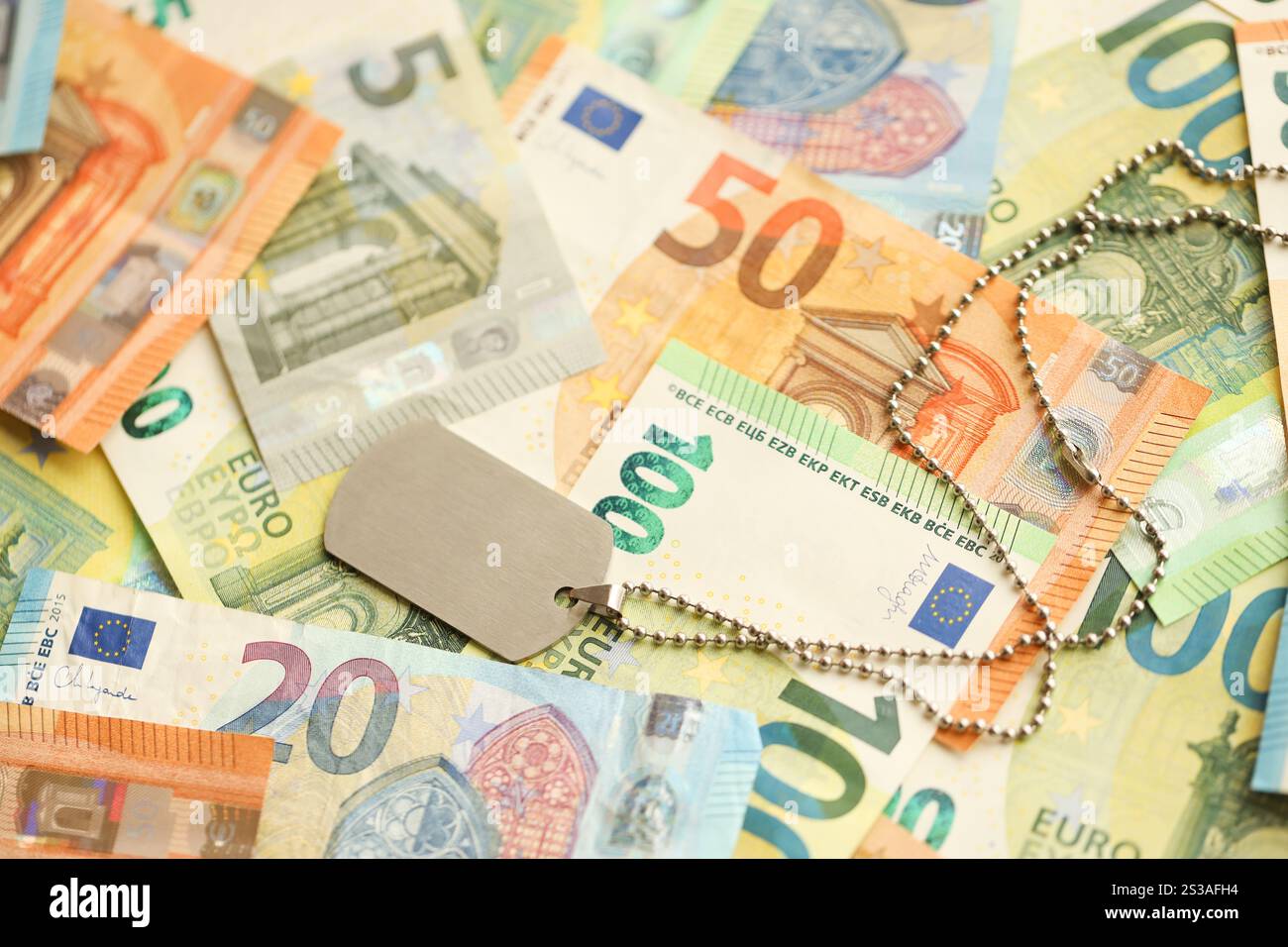 Many European euro money bills and dogtags. Lot of banknotes of ...