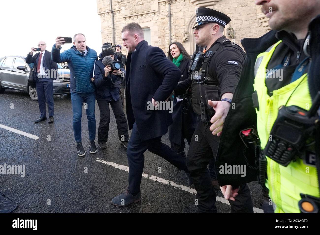 Former Scotland rugby captain Stuart Hogg (centre) leaves Selkirk ...