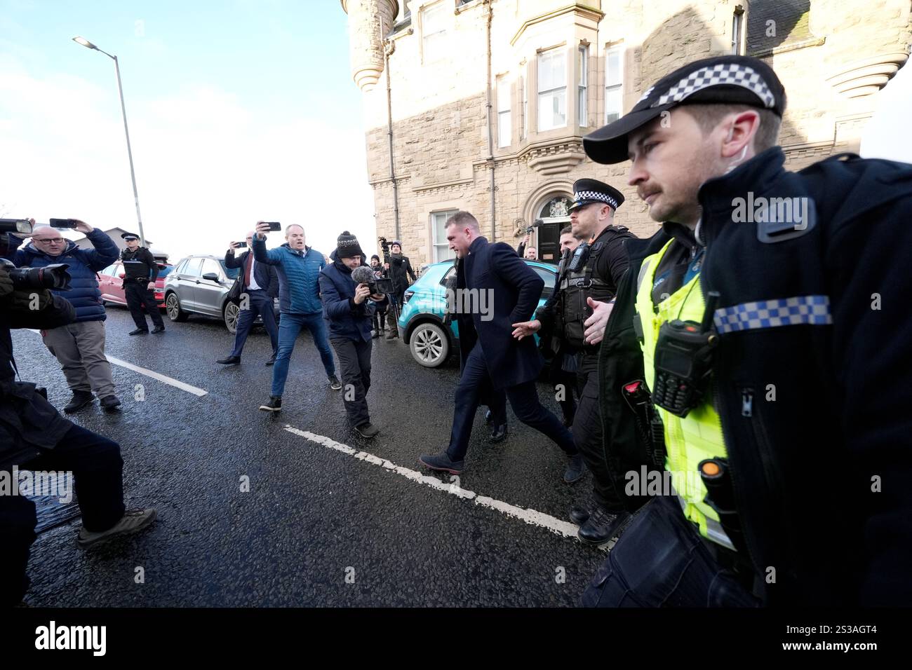Former Scotland rugby captain Stuart Hogg (centre) leaves Selkirk ...