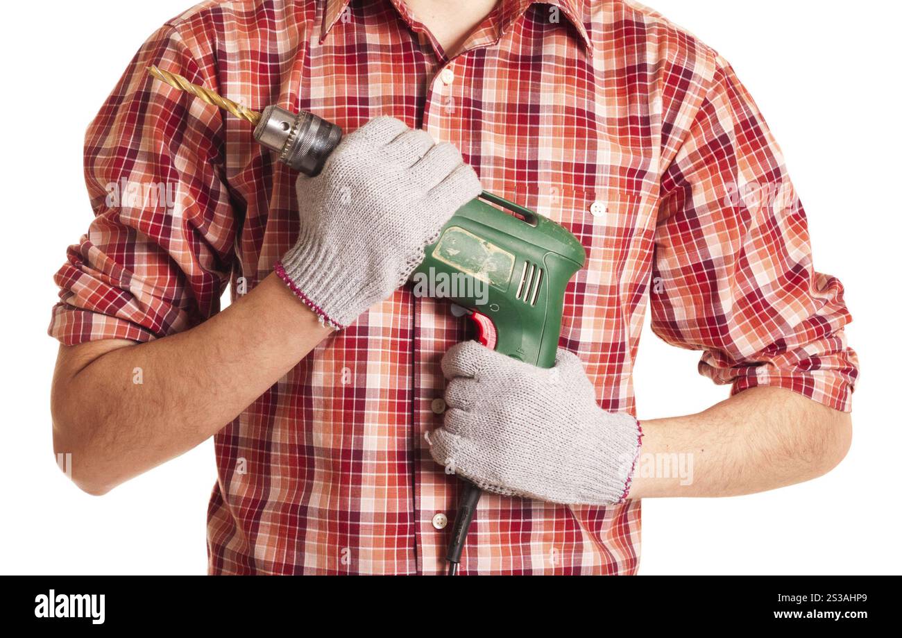 hands handling an electric drilling machine isolated on white ...