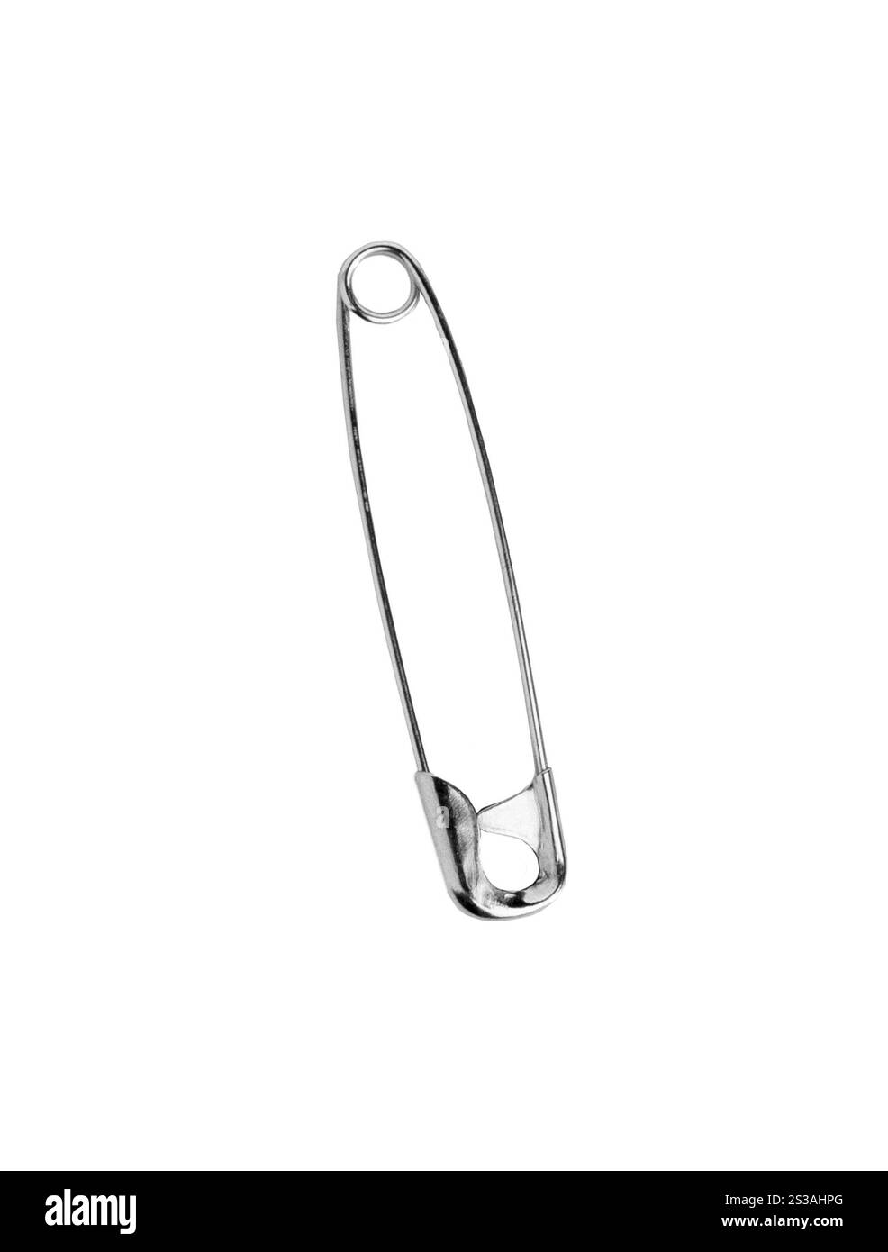 metal silhouette of a closed safety pin isolated on white background ...