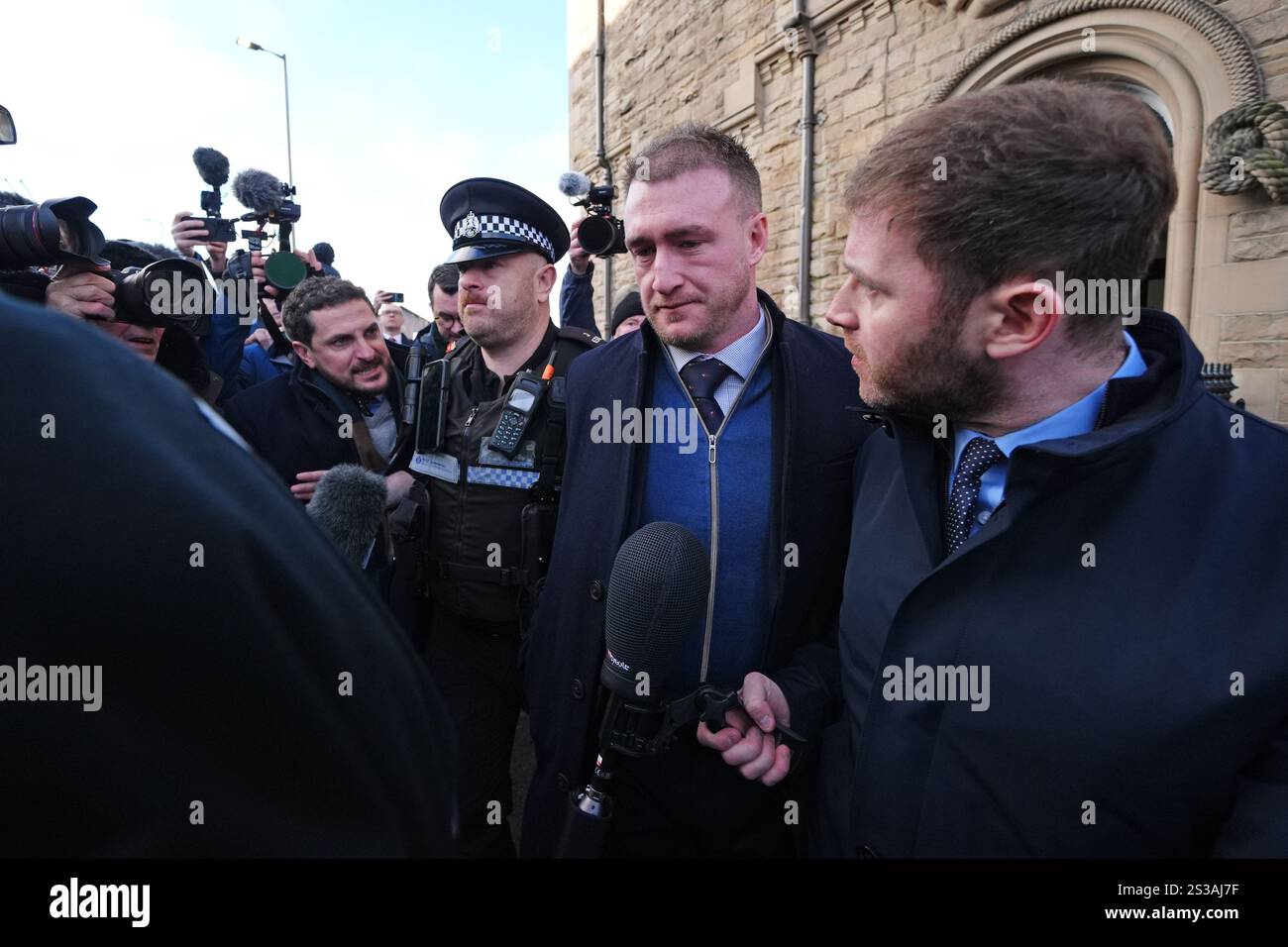 Former Scotland rugby captain Stuart Hogg (centre) leaves Selkirk ...