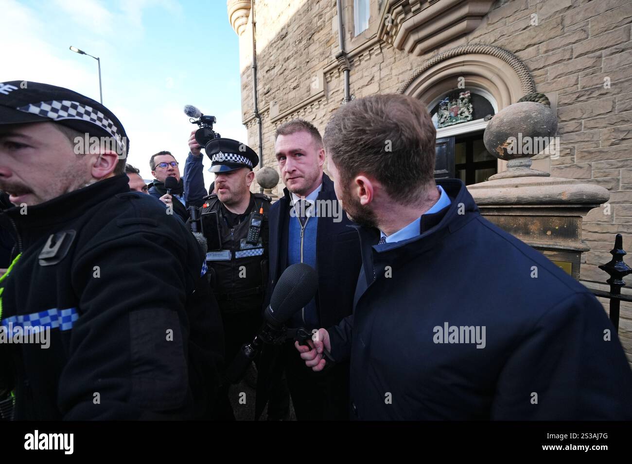 Former Scotland rugby captain Stuart Hogg (centre) leaves Selkirk ...