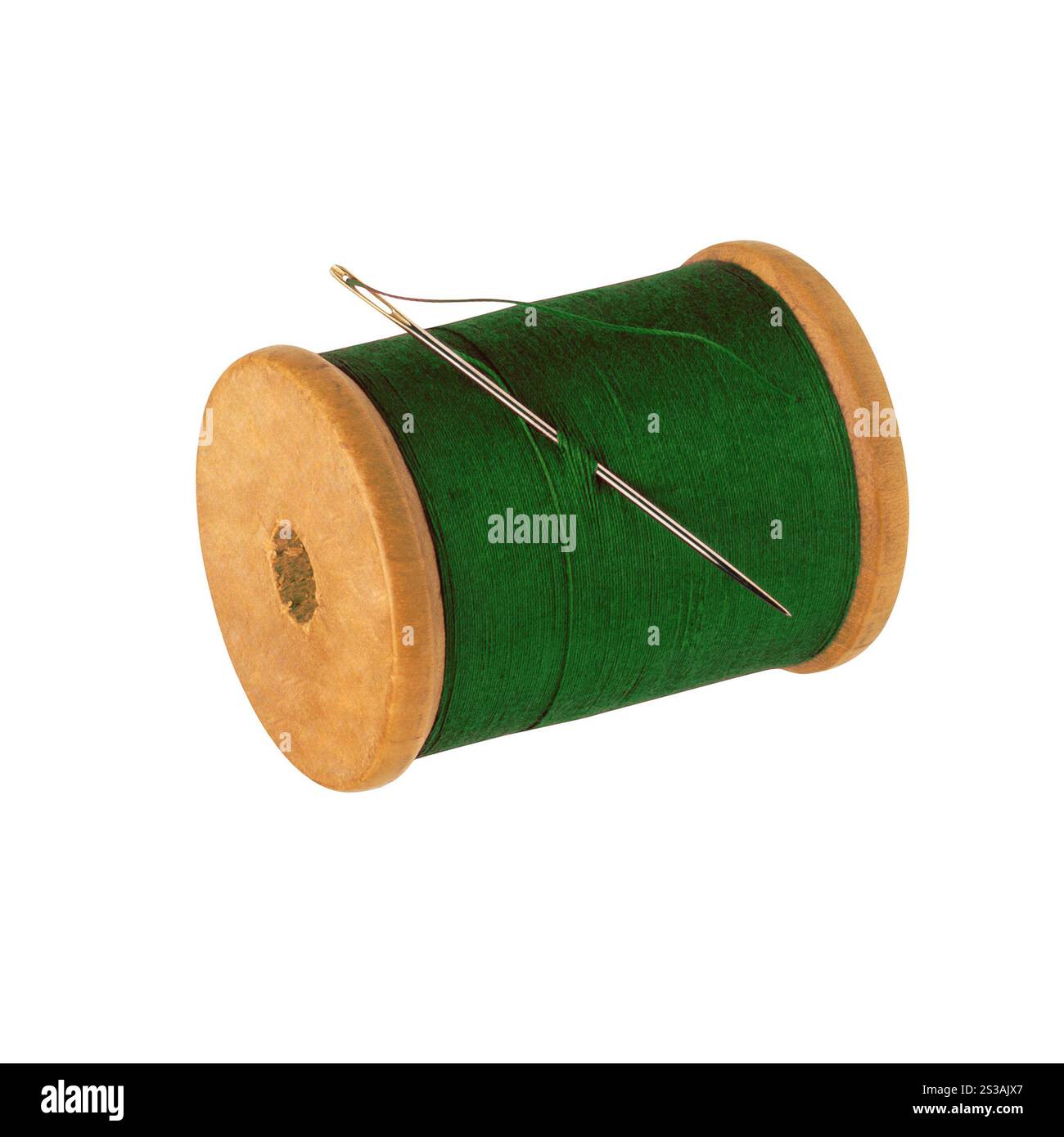 Spool of thread and needle isolated on white background. Spool of ...