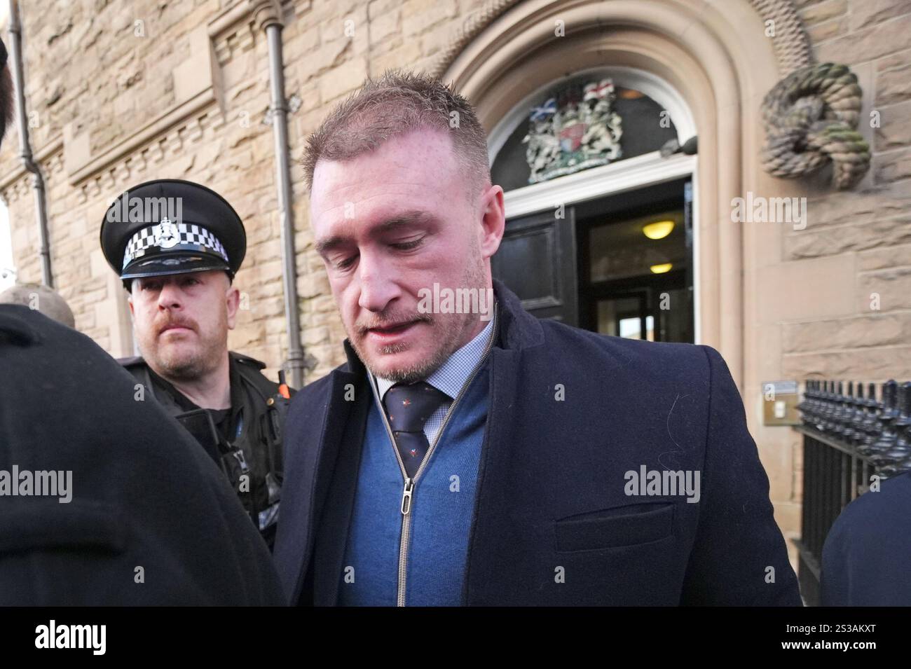 Former Scotland rugby captain Stuart Hogg (centre) leaves Selkirk ...