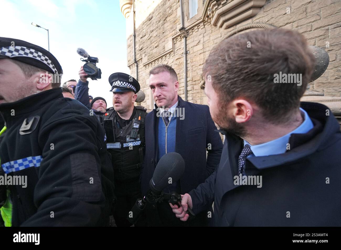 Former Scotland rugby captain Stuart Hogg (centre) leaves Selkirk ...