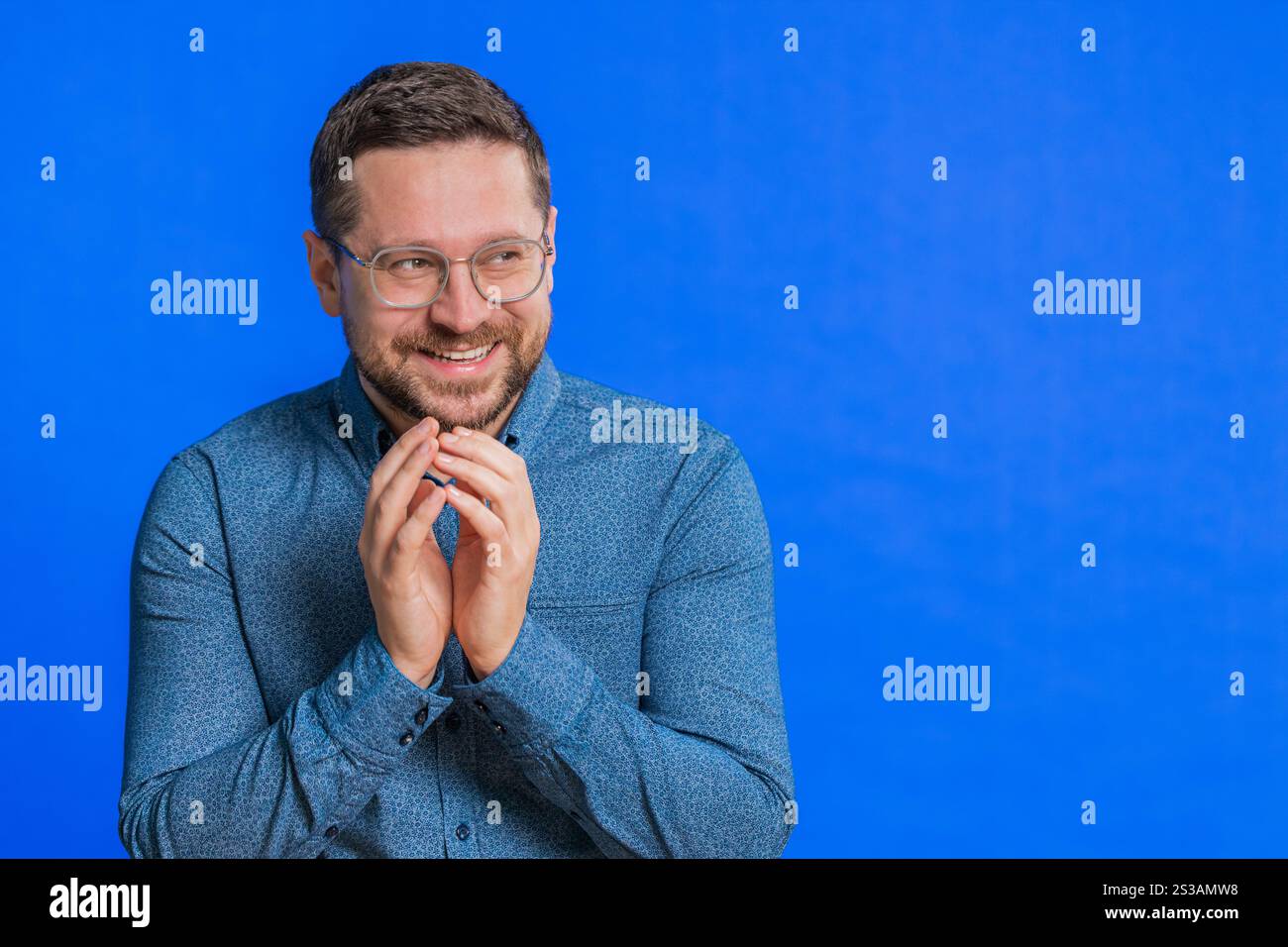 Sneaky cunning Caucasian middle-aged man in glasses with tricky face ...