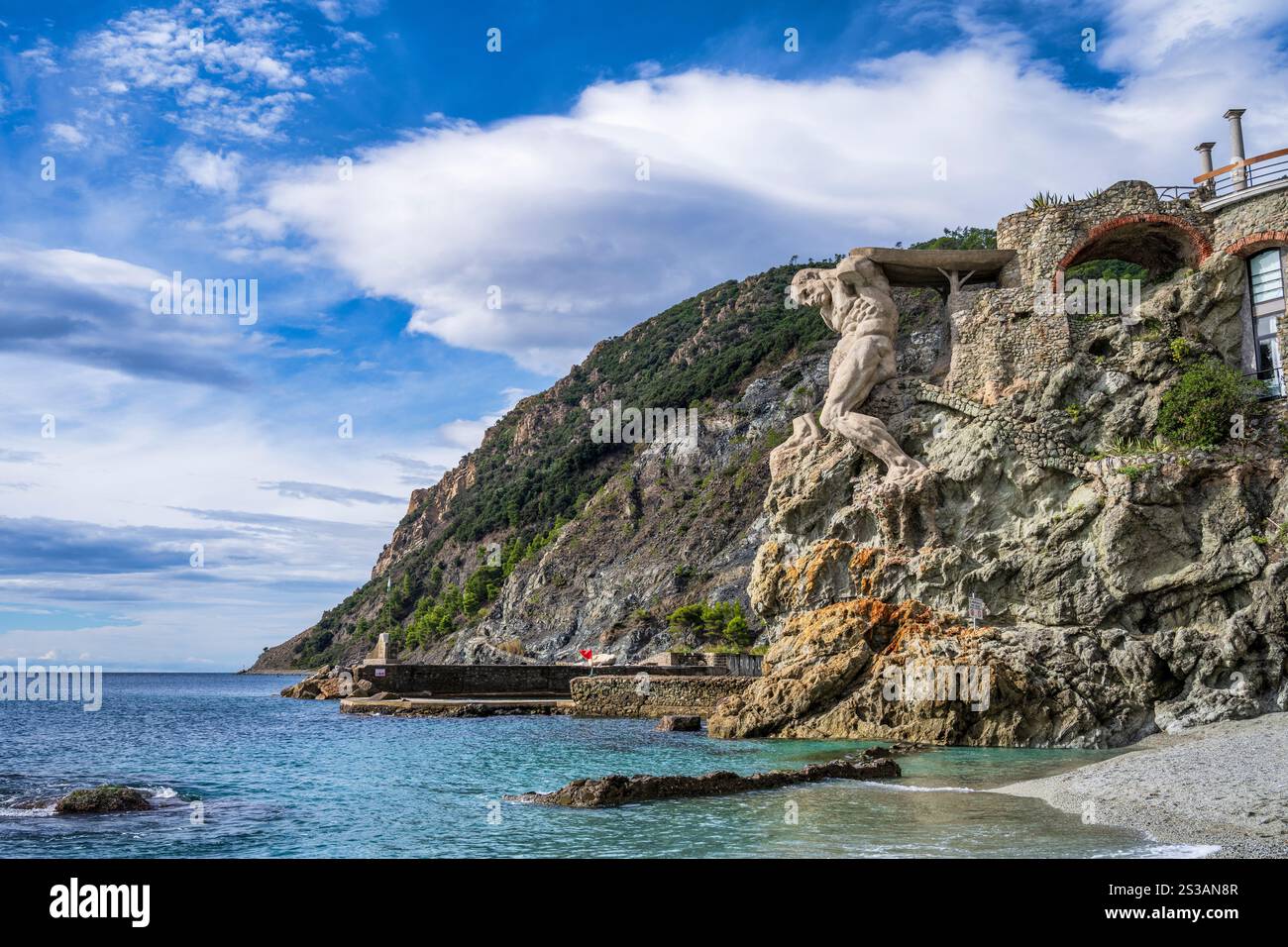 Statue of the Giant at western end of public beach of Monterosso al ...