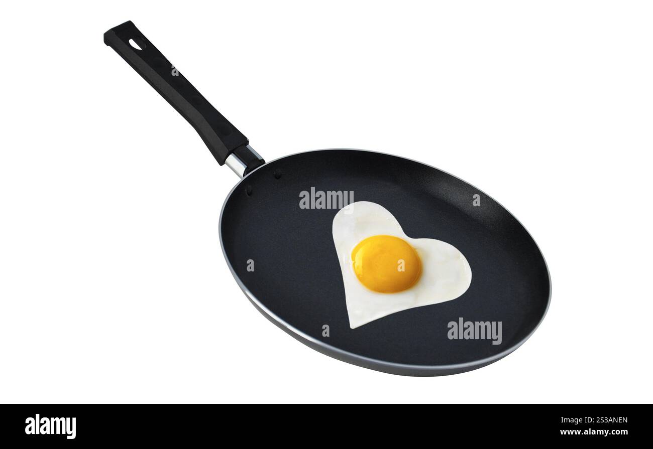 fried egg in the hearts shape isolated on white background. fried egg ...