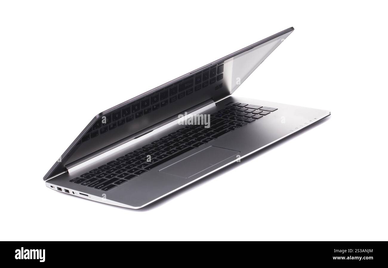 Silver laptop half closed on white background Stock Photo - Alamy