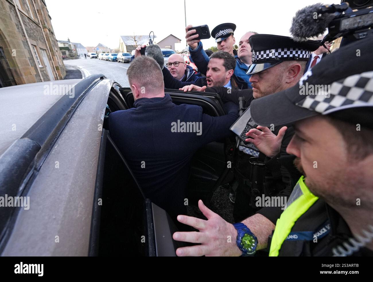 Former Scotland rugby captain Stuart Hogg (centre) leaves Selkirk ...