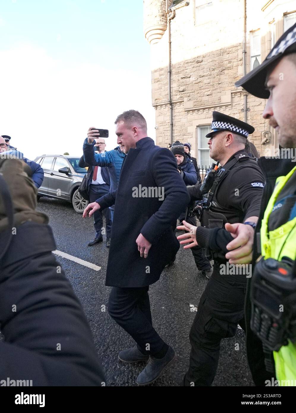 Former Scotland rugby captain Stuart Hogg (centre) leaves Selkirk ...