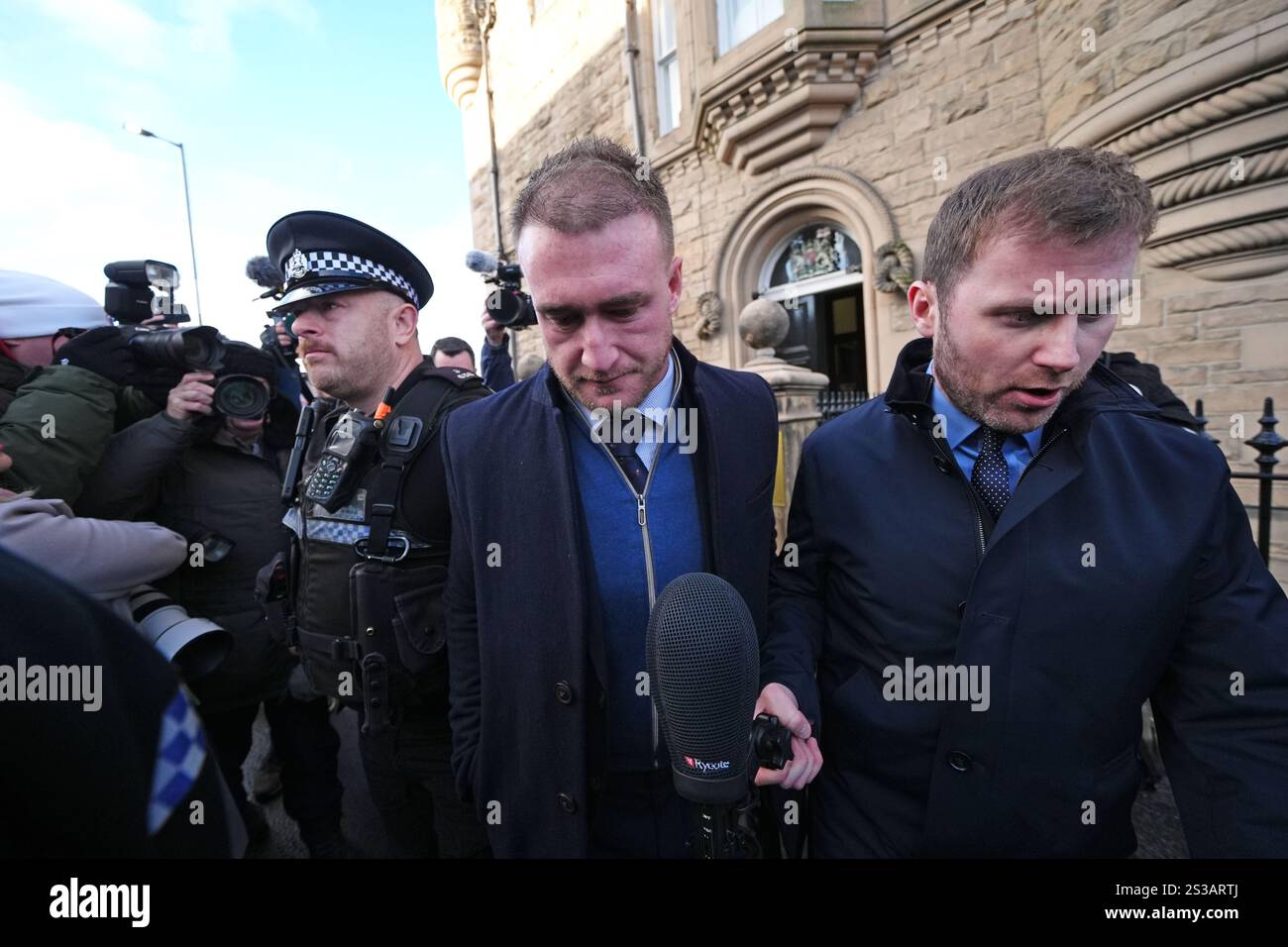 Former Scotland rugby captain Stuart Hogg (centre) leaves Selkirk ...