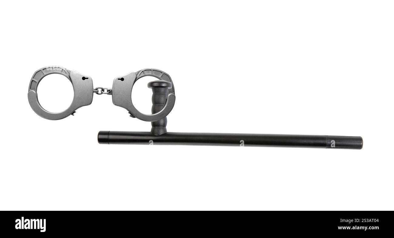 Rubber baton lying and handcuffs on a white background. Rubber baton ...
