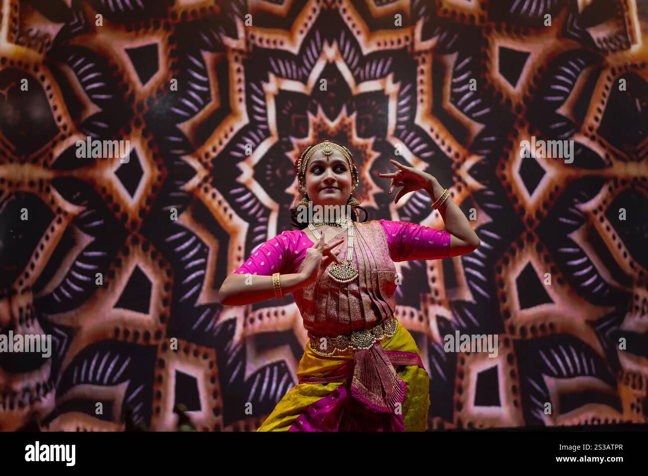 Graceful classical dance performance in traditional attire with a ...