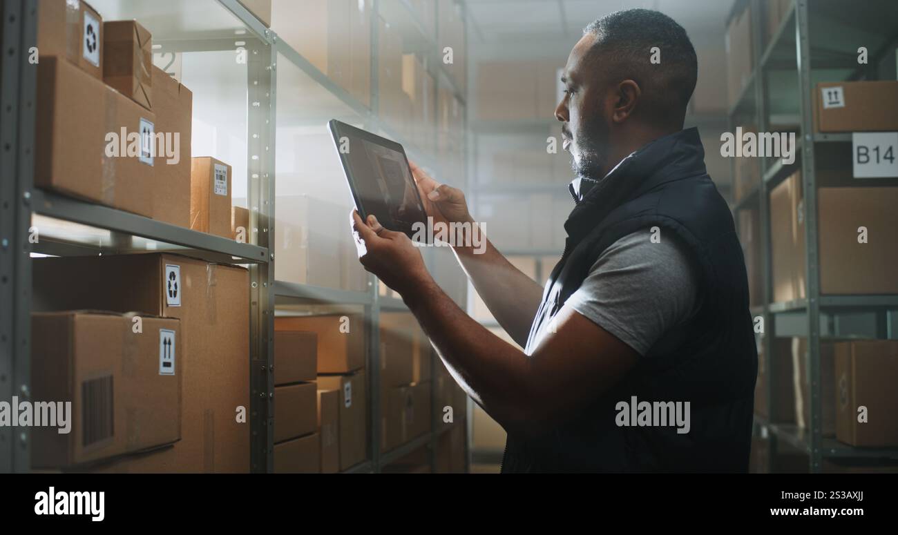 African American Warehouse Associate Scans Cardboard Box with E-Commerce Online Orders on Shelf ...
