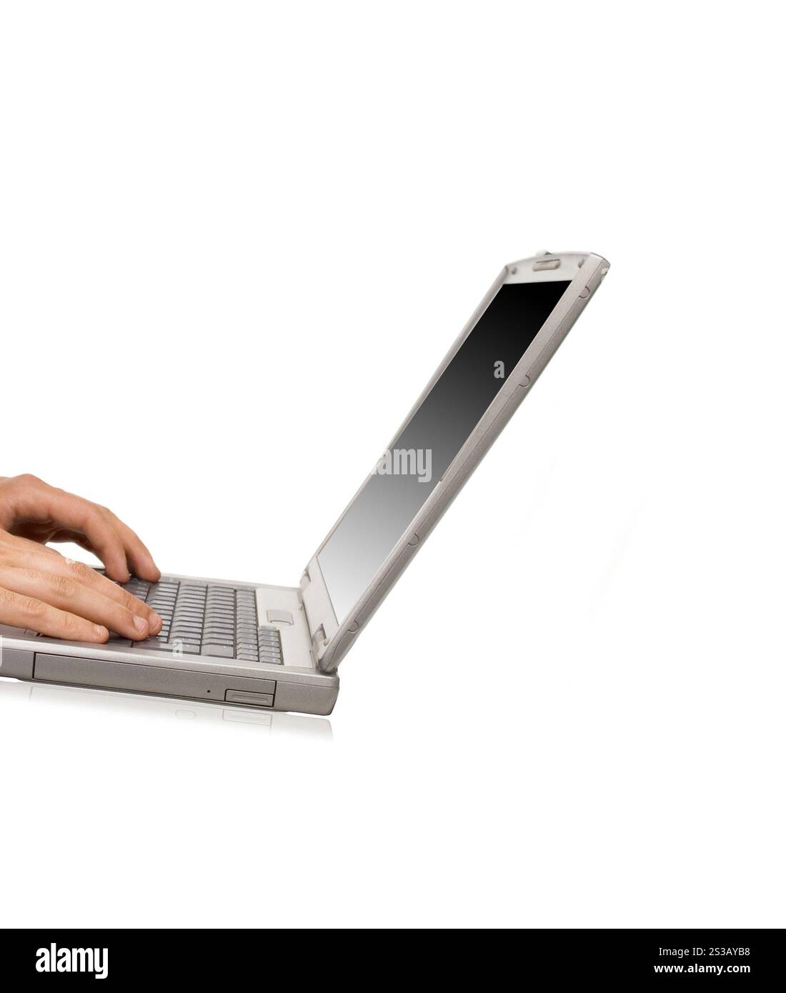 Businessman typing on a notebook isolated on white background ...