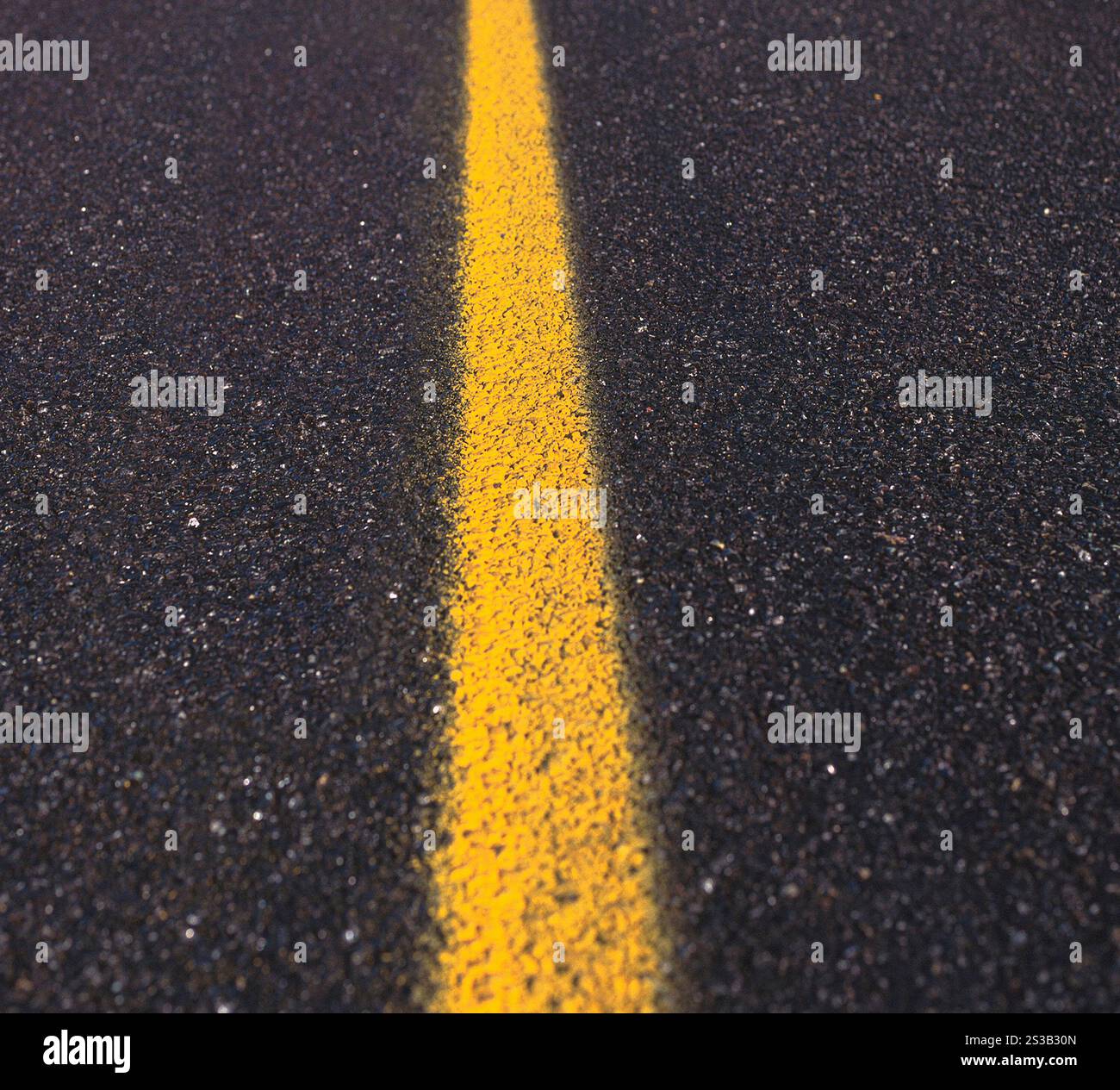 Asphalt road texture with yellow stripe. Asphalt road Stock Photo - Alamy