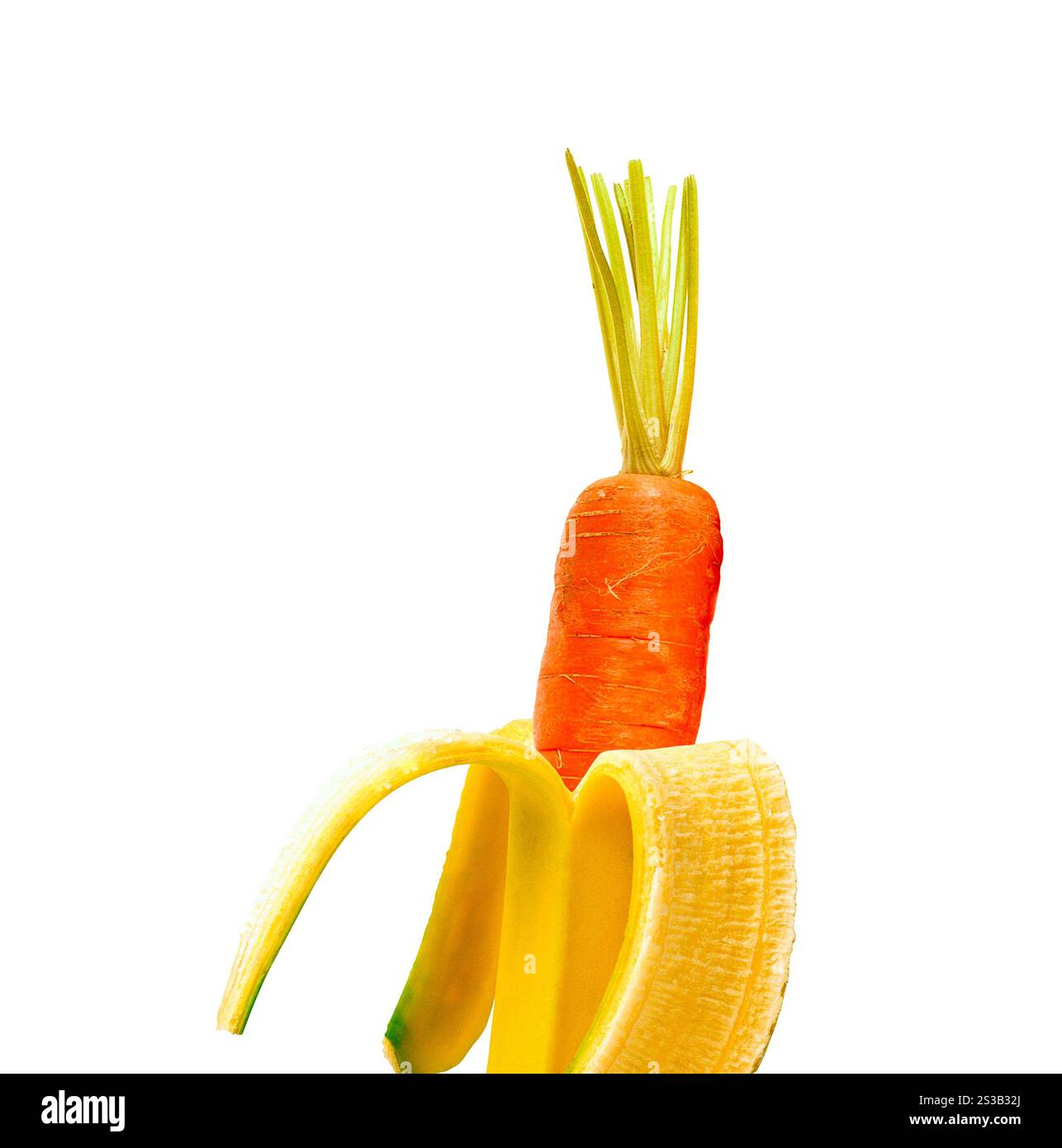 Carrot inside of banana isolated on white. Carrot inside of banana ...