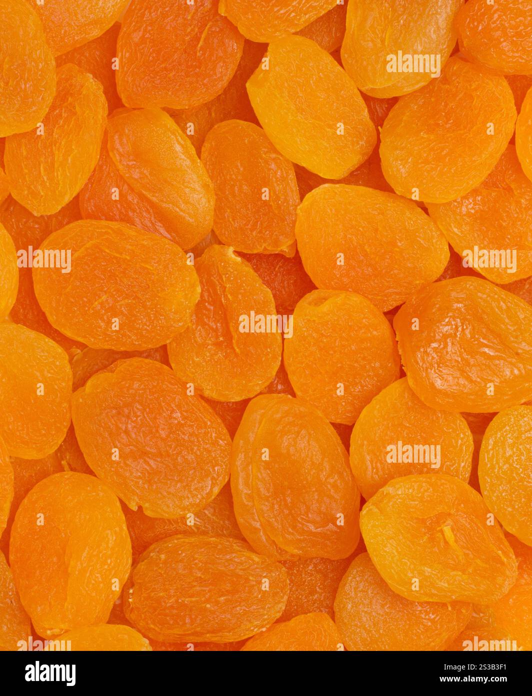 Dried apricots background or texture. Dried apricots Stock Photo - Alamy