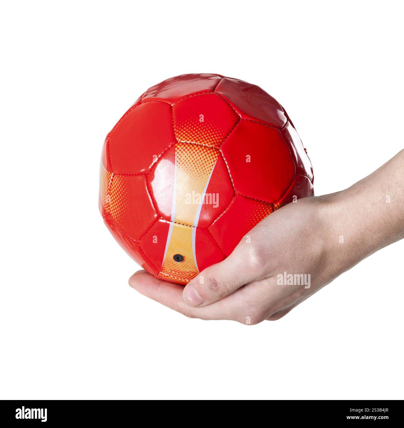 small soccer red ball in hand isolated on white background. small ...