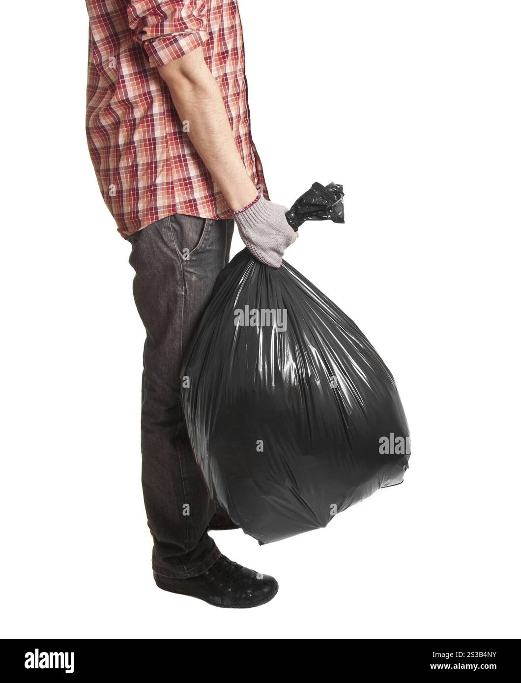 Man holding black plastic trash bag in his hand isolated on white ...