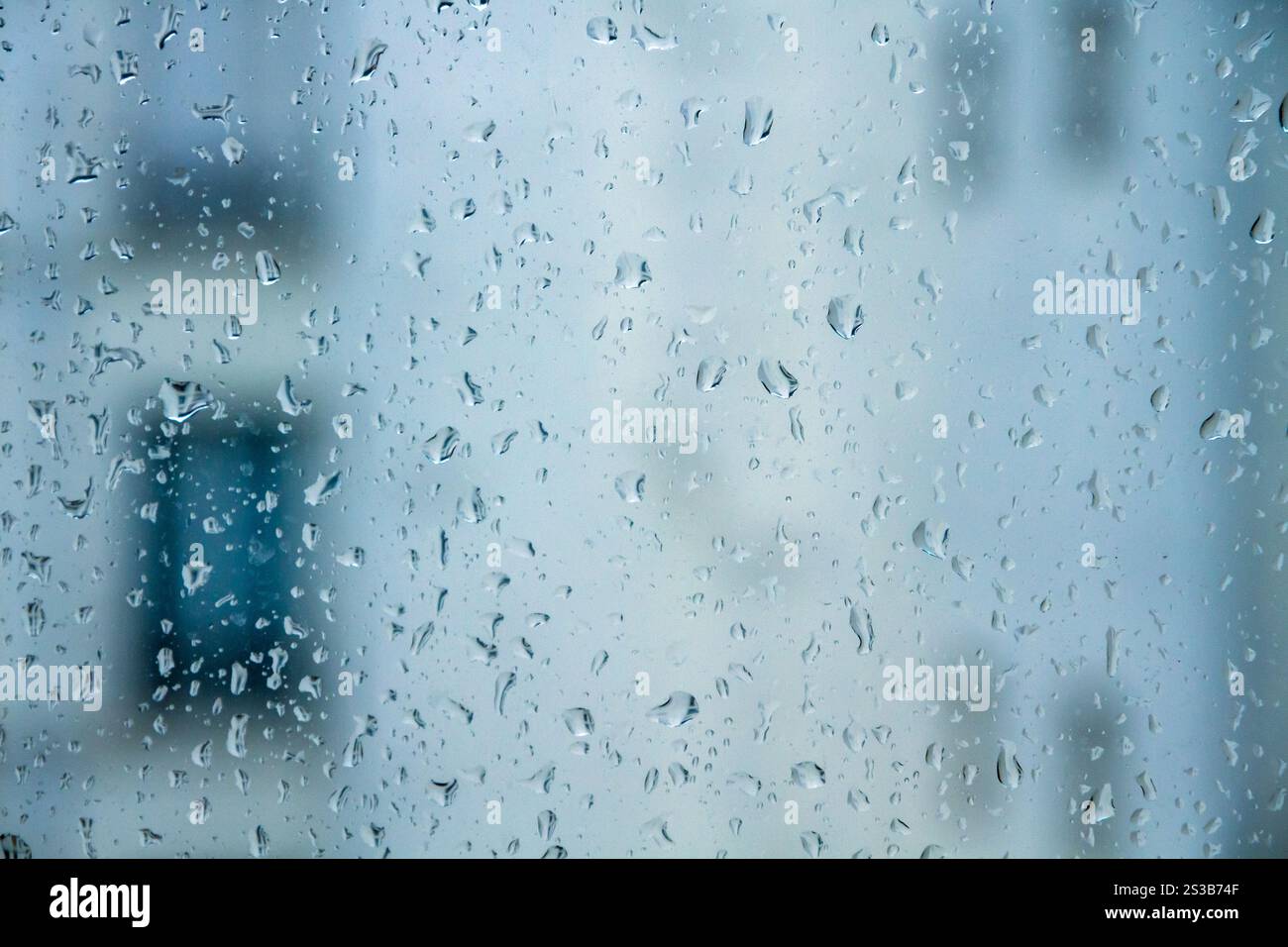 Rain drops on a window. Abstract background wallpaper. Rain drops on a ...