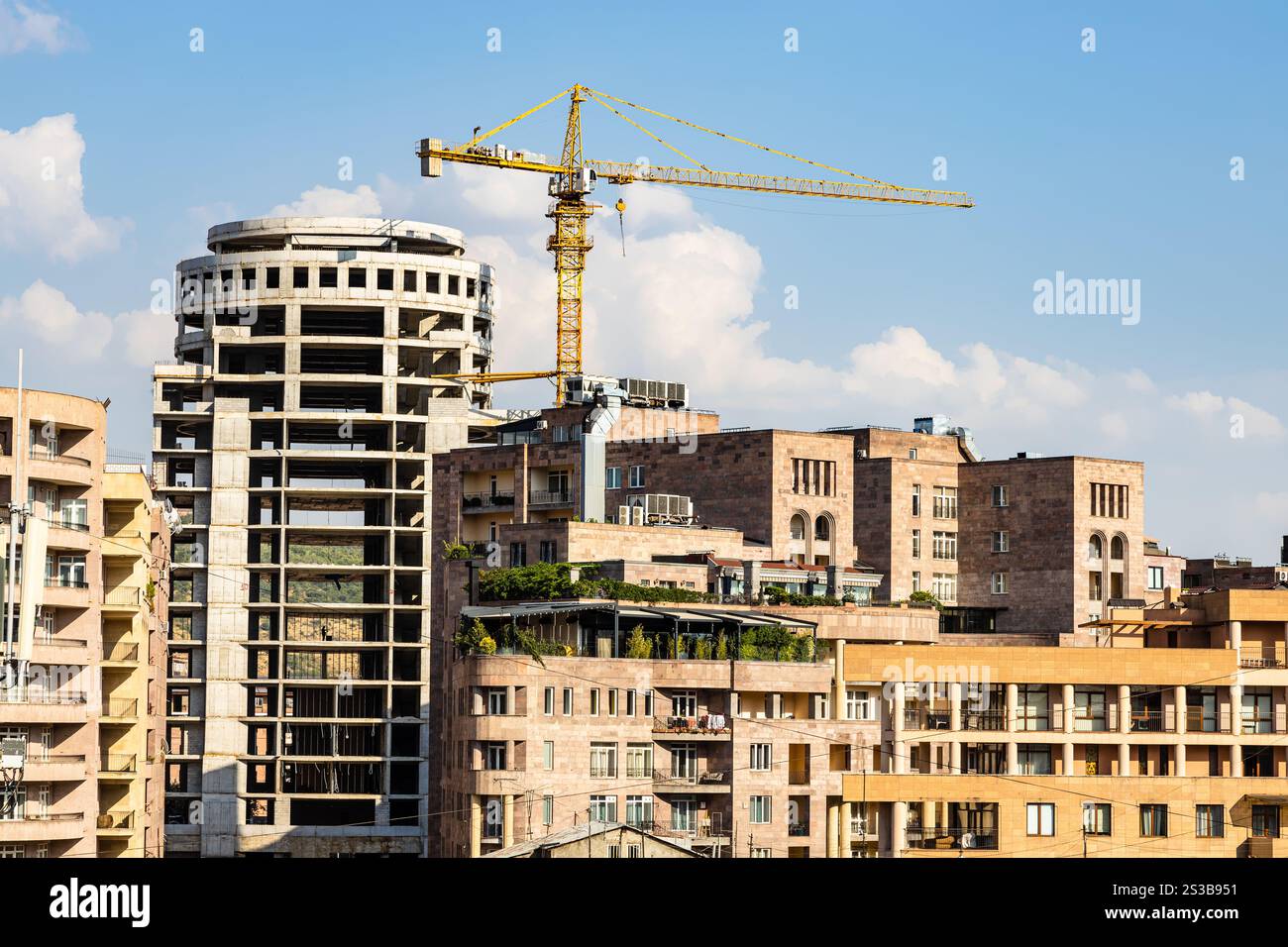 construction of high-rise urban houses in Yerevan city Armenia on sunny ...