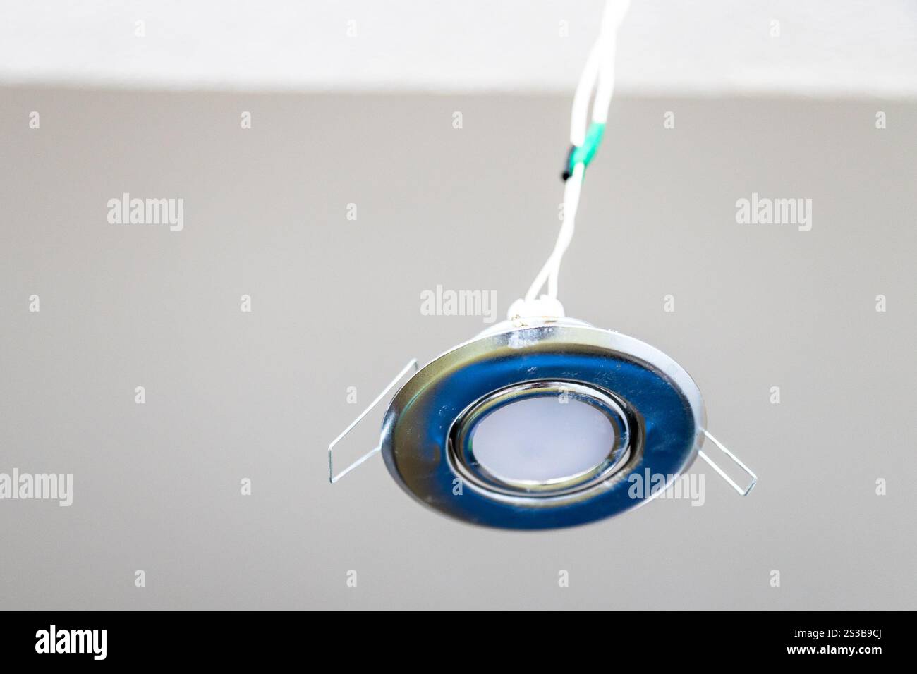repairing built-in ceiling light in room close up Stock Photo - Alamy