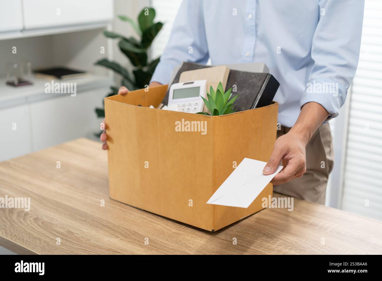 sending resignation letter to boss and Holding Stuff Resign Depress or ...