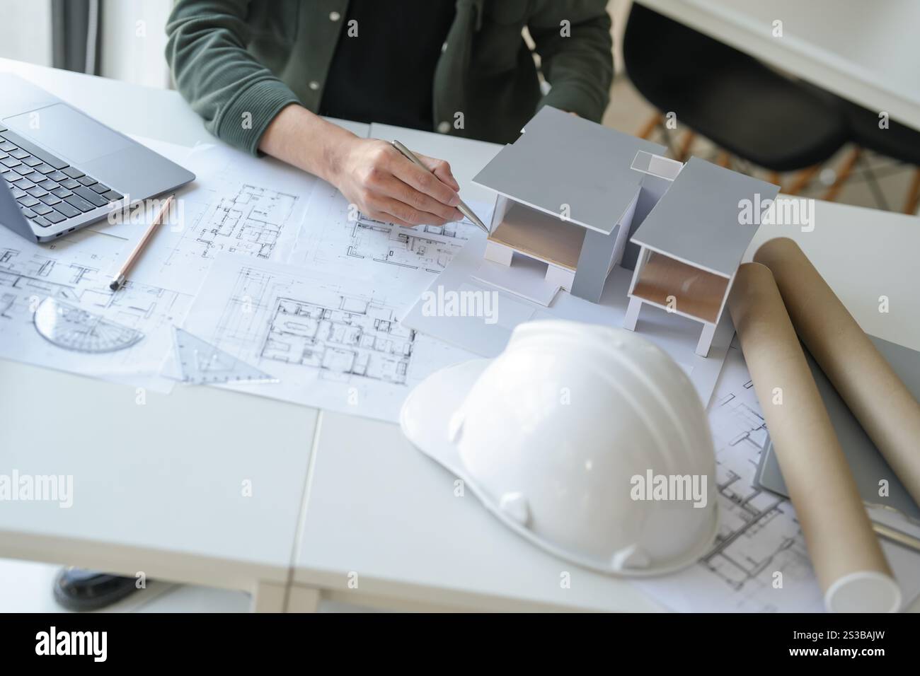 Architecture Man drawing on architectural Creative project business ...