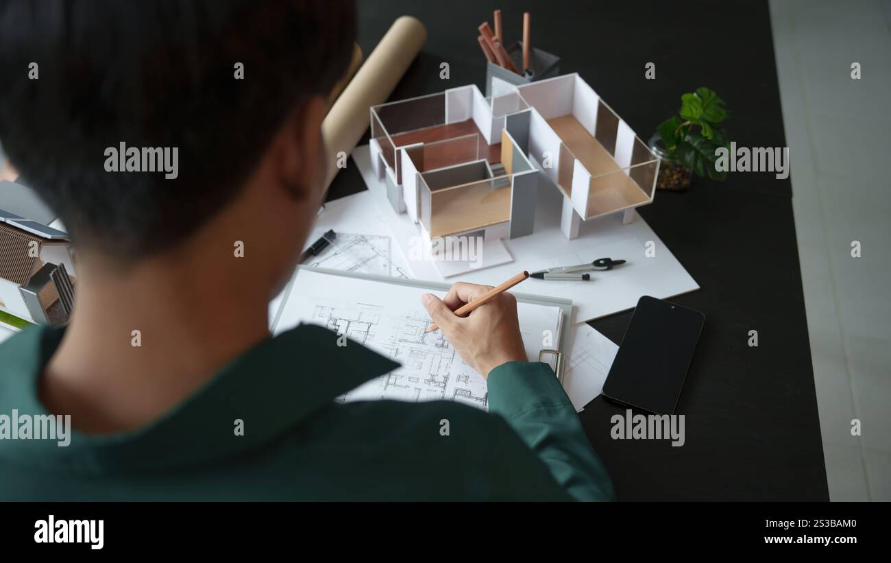 Green Eco Architecture Man drawing on architectural Creative project ...