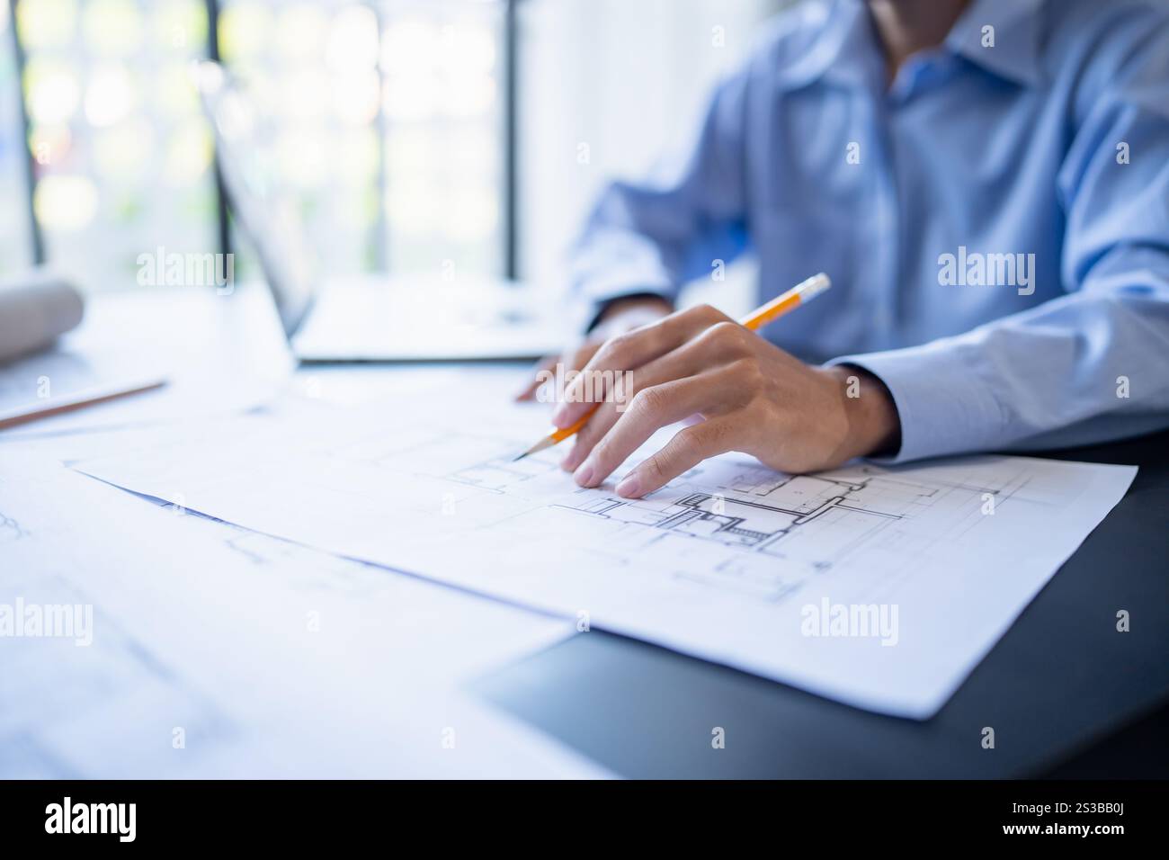 Architecture Man drawing on architectural Creative project business ...