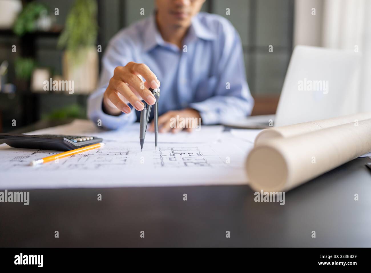 Architecture Man drawing on architectural Creative project business ...