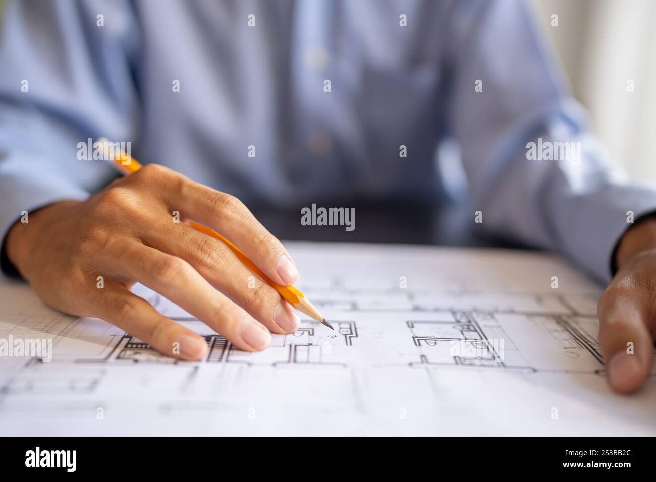 Architecture Man drawing on architectural Creative project business ...