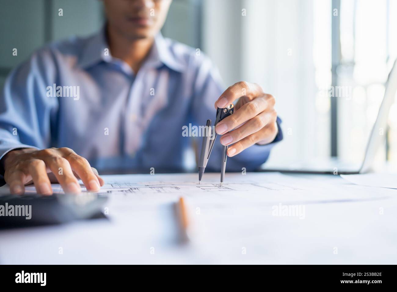 Architecture Man drawing on architectural Creative project business ...