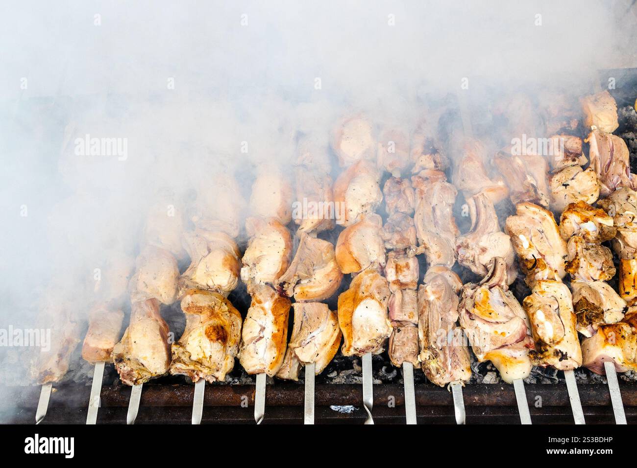skewered armenian Khorovats barbeque from meat close up on outdoor ...