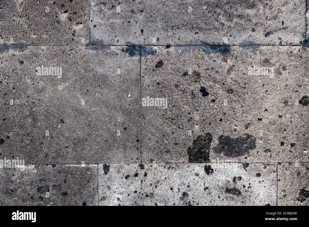 detail of wall of house from natural black tuff stone blocks in Gyumri ...