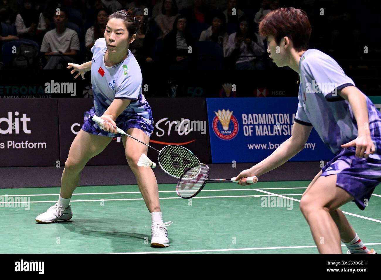 (250109) -- KUALA LUMPUR, Jan. 9, 2025 (Xinhua) -- Jia Yifan/Zhang Shuxian (R) of China compete ...