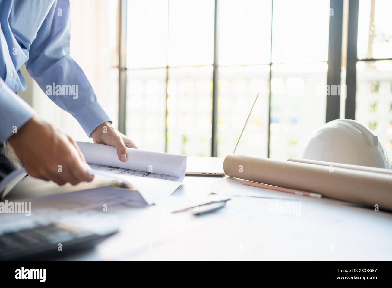 Architecture Man drawing on architectural Creative project business ...