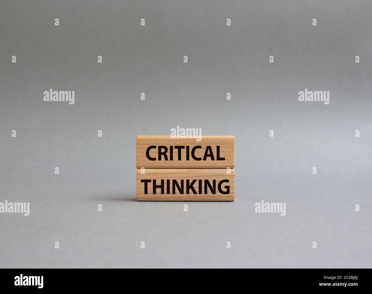 Critical thinking symbol. Wooden blocks with words Critical thinking ...