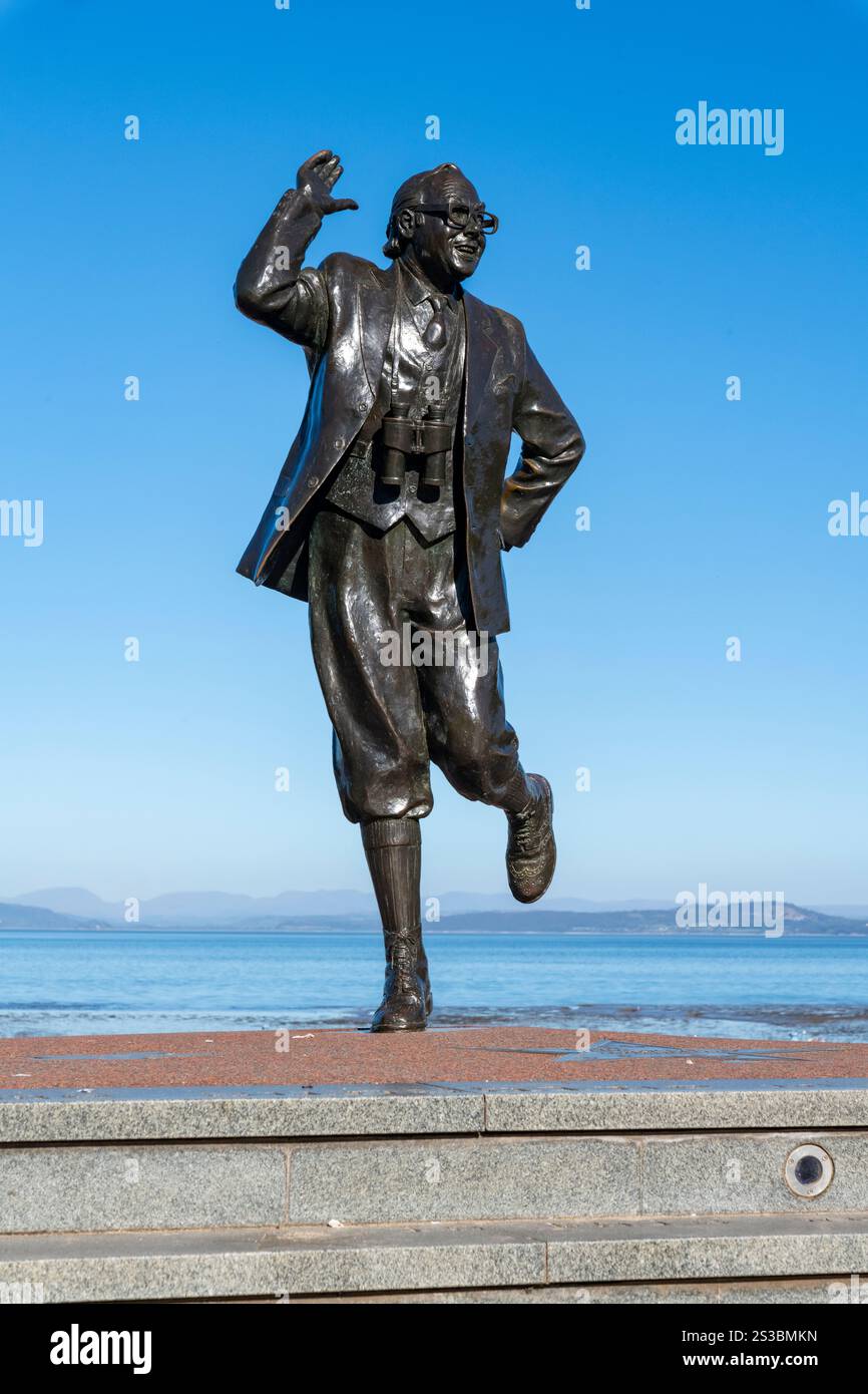 Statue of the famous comedian Eric Morecambe on the promenade in the ...
