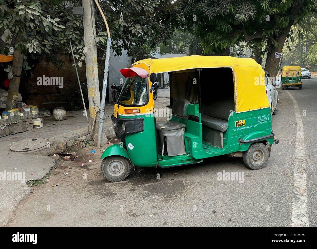 18 December 2024, India, Neu Delhi: An autorickshaw (tuk-tuk) stands at ...