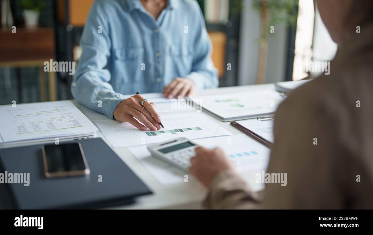 Multiethnic female staff accounting hi-res stock photography and images ...